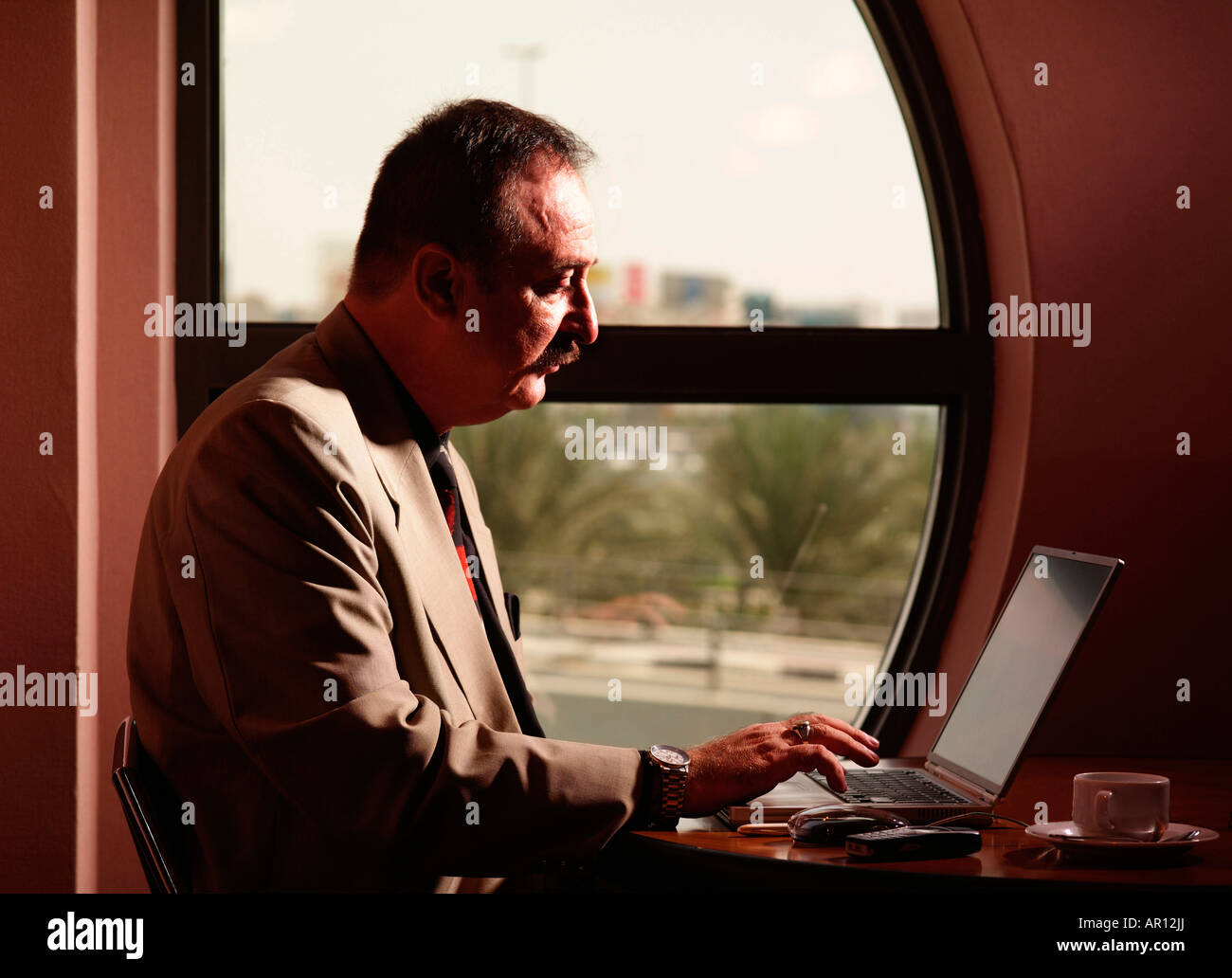 Businessman working on the computer Stock Photo - Alamy