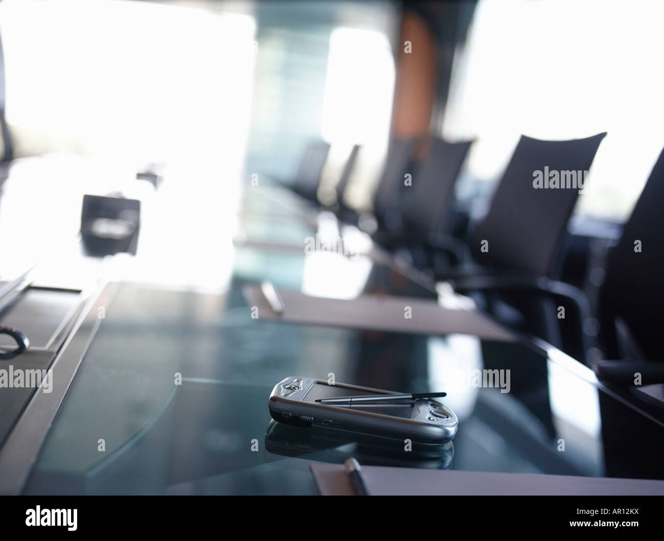 Mobile phone in a conference room Stock Photo - Alamy
