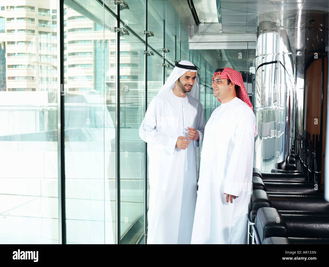 Arab men talking hi-res stock photography and images - Alamy