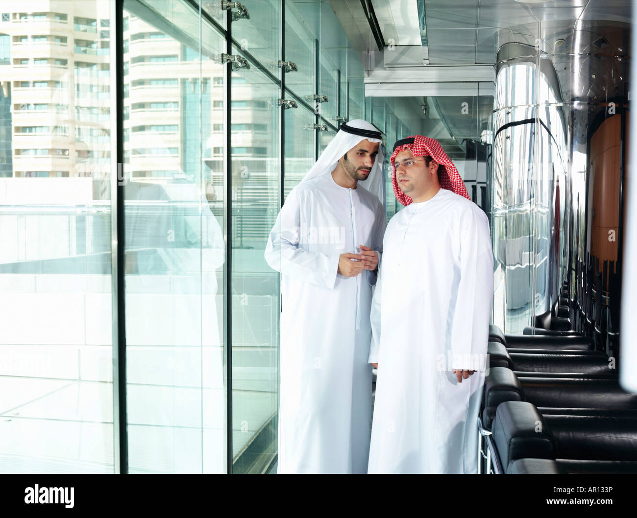 Arab men talking Stock Photo - Alamy