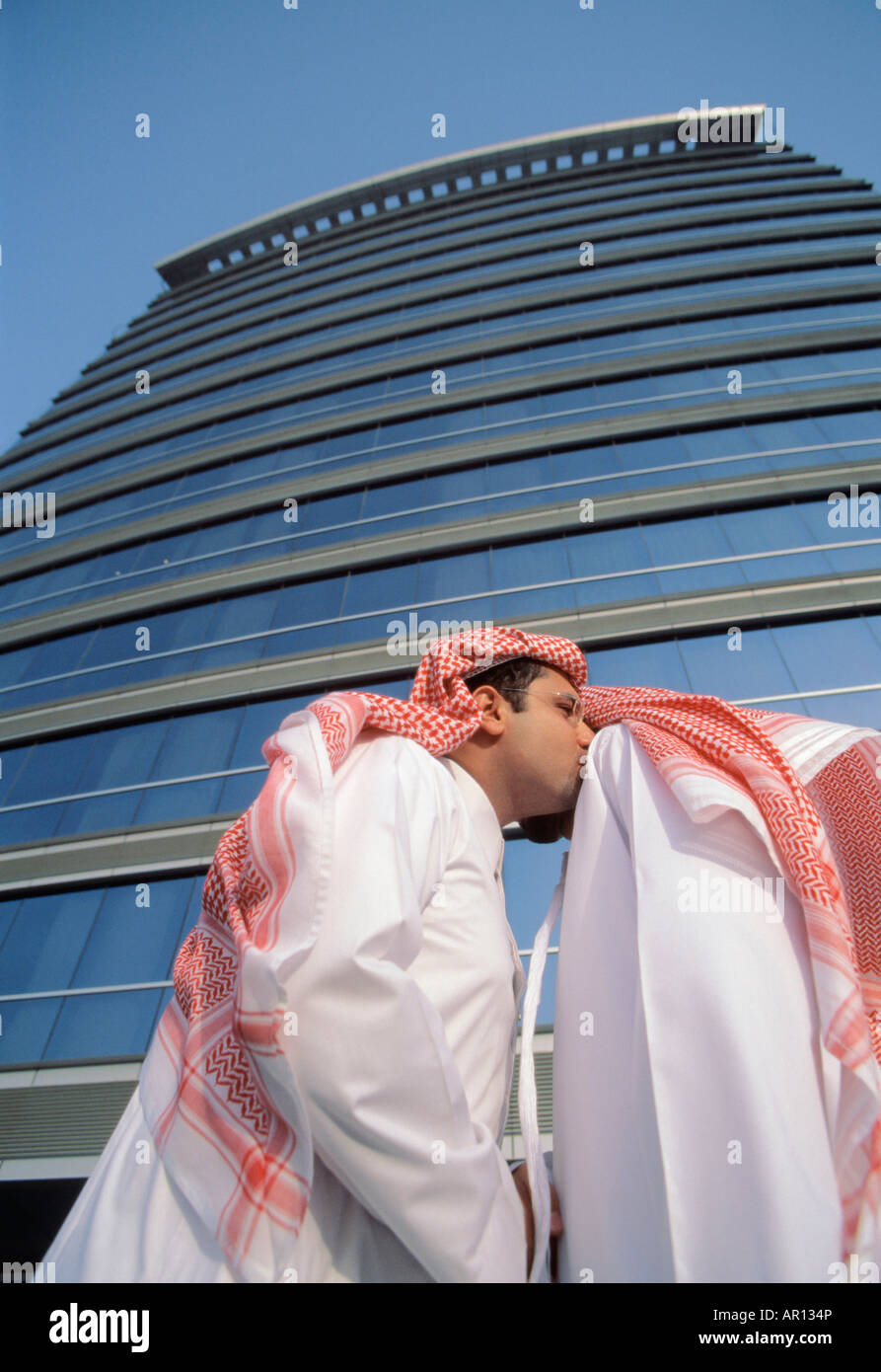 Arab men greeting each other Stock Photo - Alamy