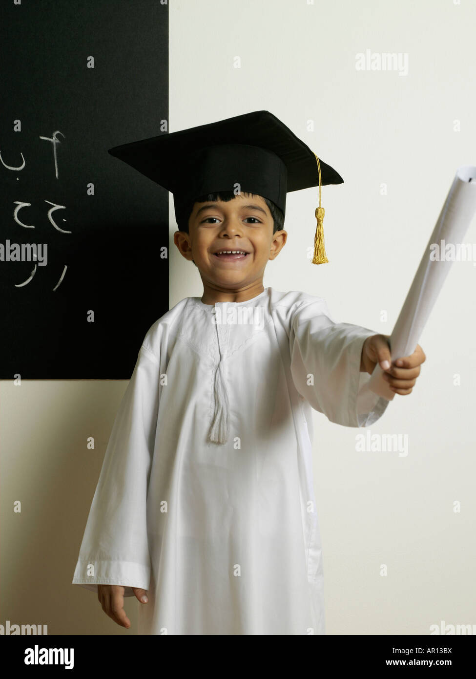 Arab Boy with graduation cap Stock Photo - Alamy