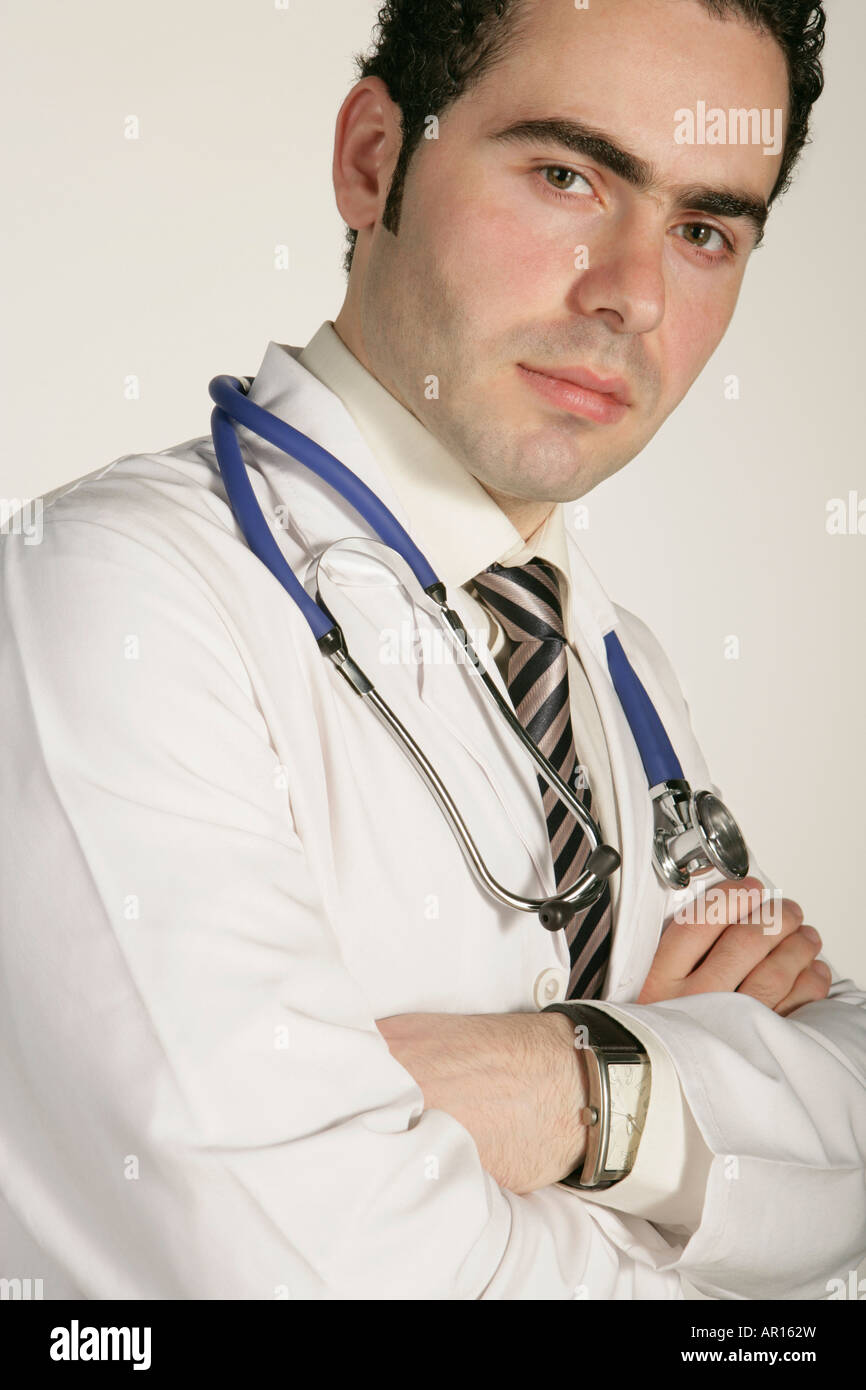 Doctor Looking at Camera Stock Photo - Alamy