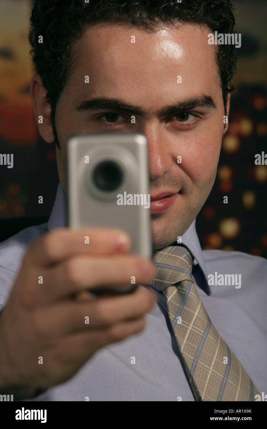 Businessman take a snap shot Stock Photo - Alamy