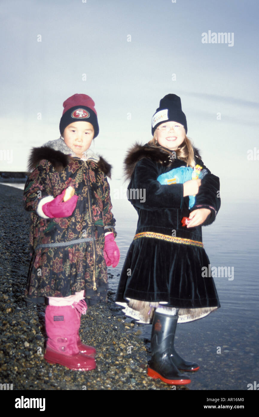 young Inupiat girls wearing traditional fur trimmed and lined parkas ...