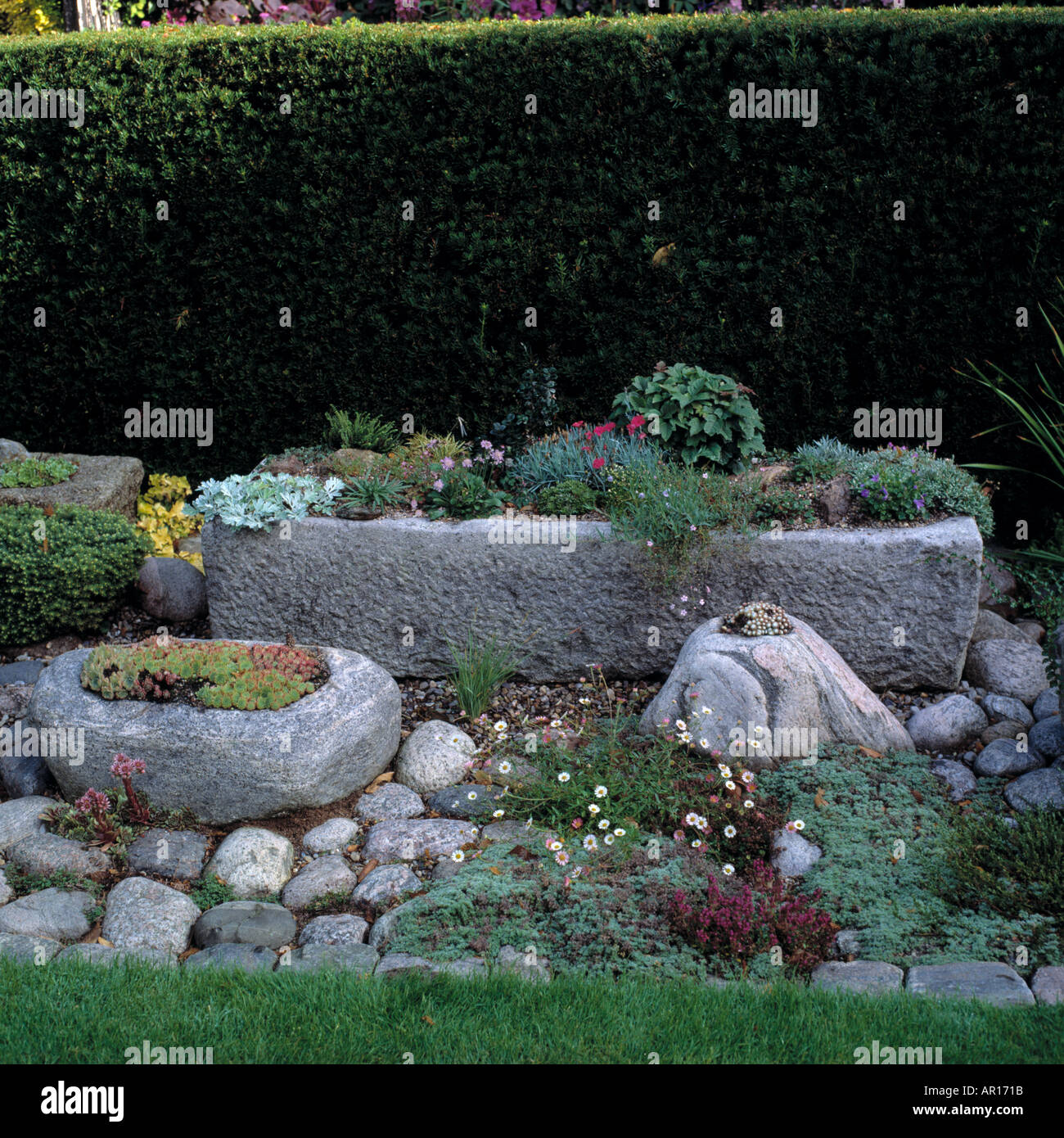 Stone Garden Containers Stock Photo - Alamy