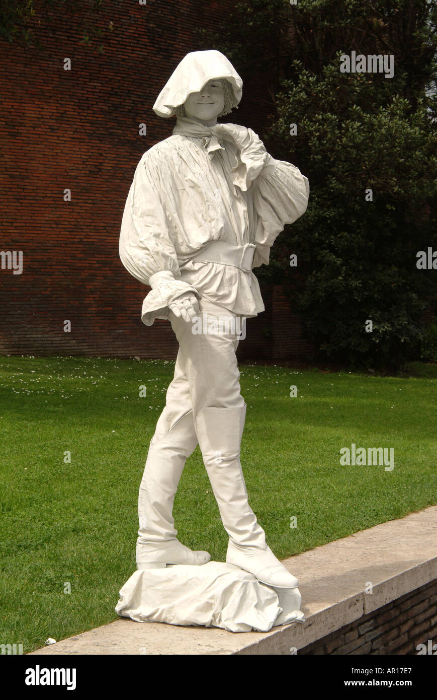 White painted mime posing as a statue act Colosseum Rome Italy Europe ...