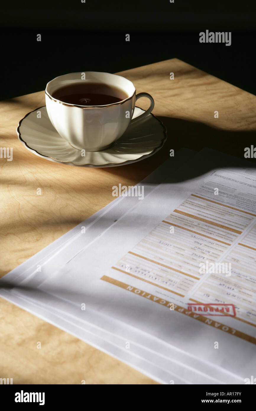 Cups of coffee and forms Stock Photo - Alamy