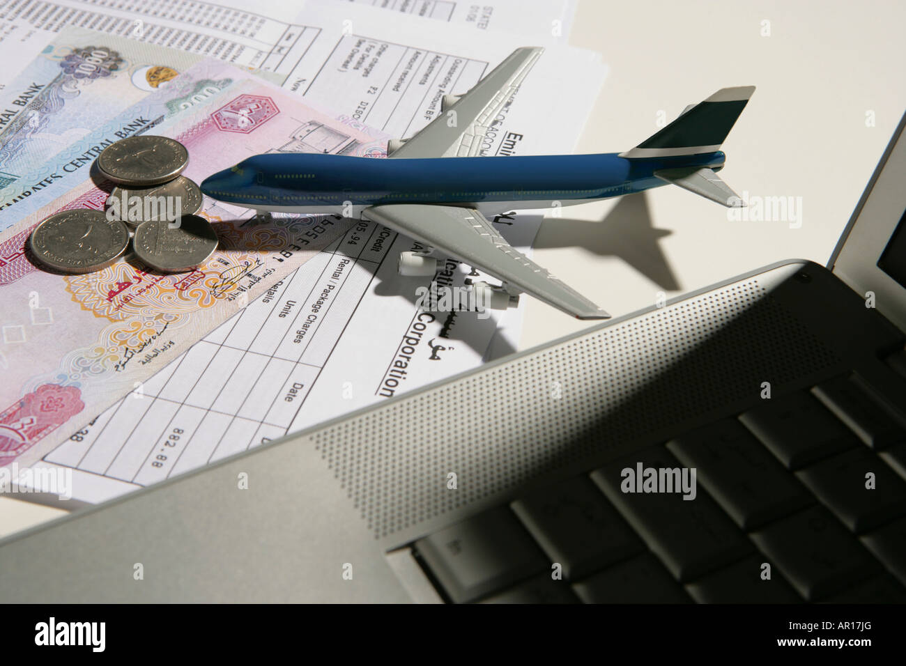 Aircraft with money Stock Photo - Alamy