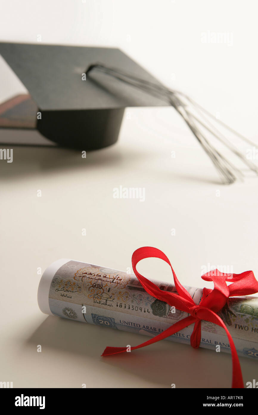 Graduation Cap and Money Stock Photo - Alamy