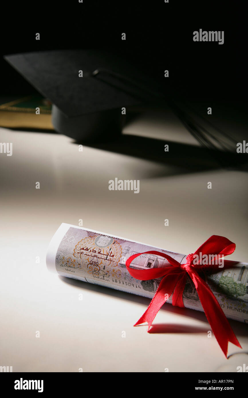 Graduation Cap and Money Stock Photo - Alamy