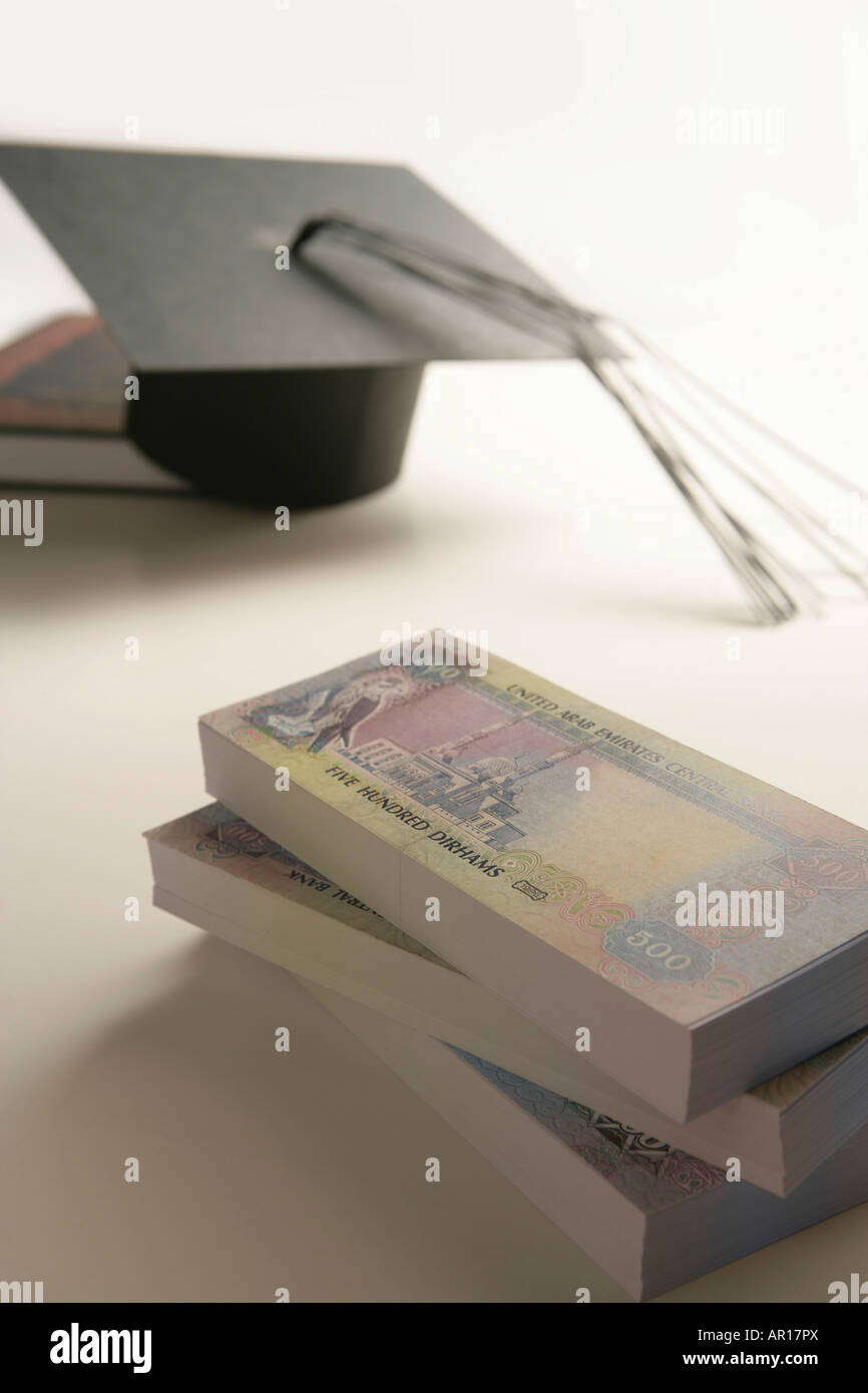Graduation Cap and Money Stock Photo - Alamy