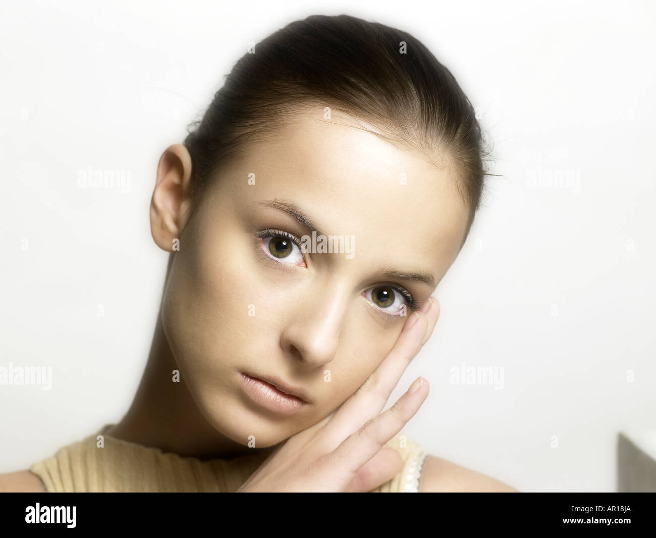 indoor studio woman young girl 20 25 dark hair blouse yellow make up ...