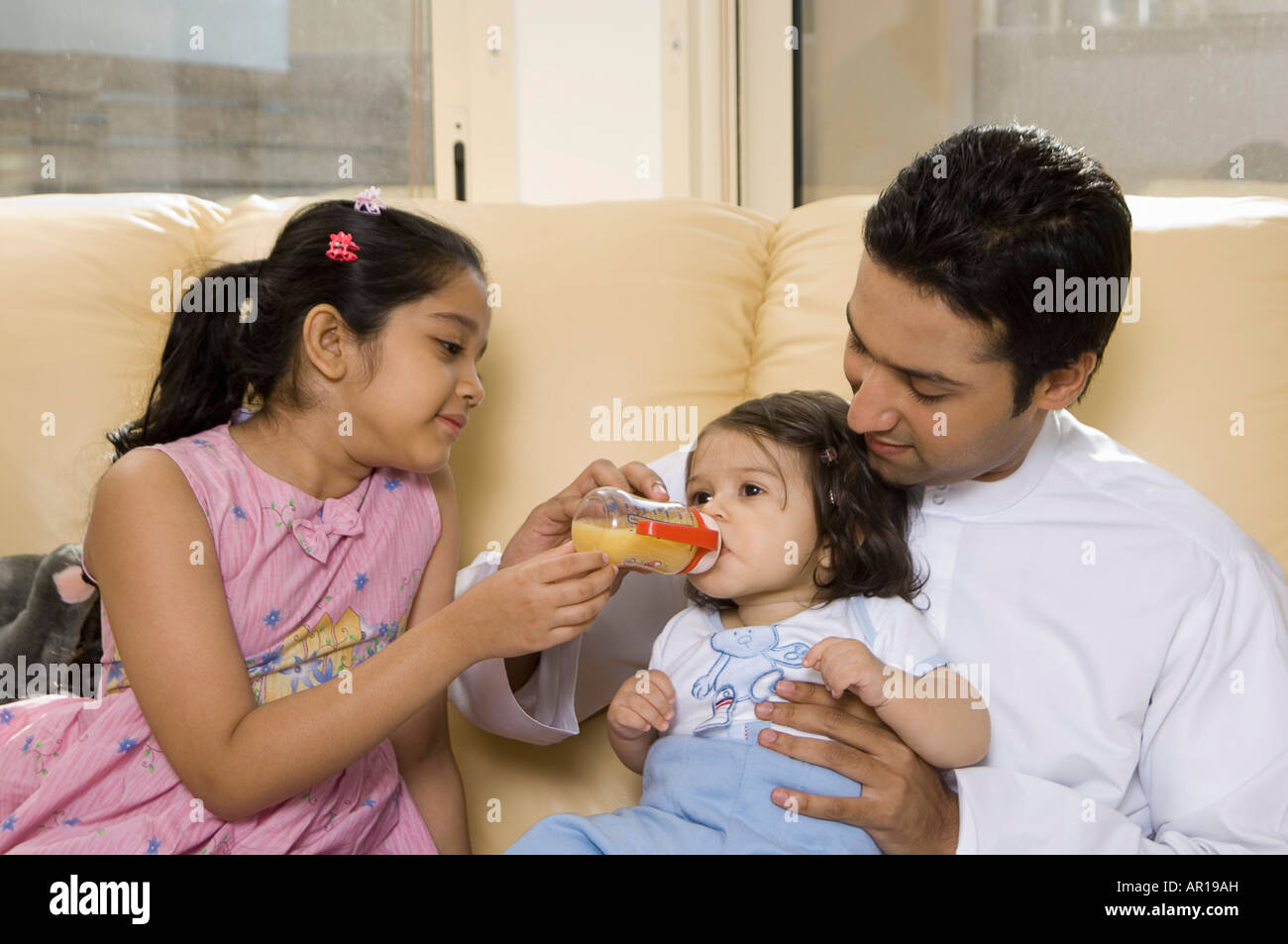 Father two children support hi-res stock photography and images - Alamy