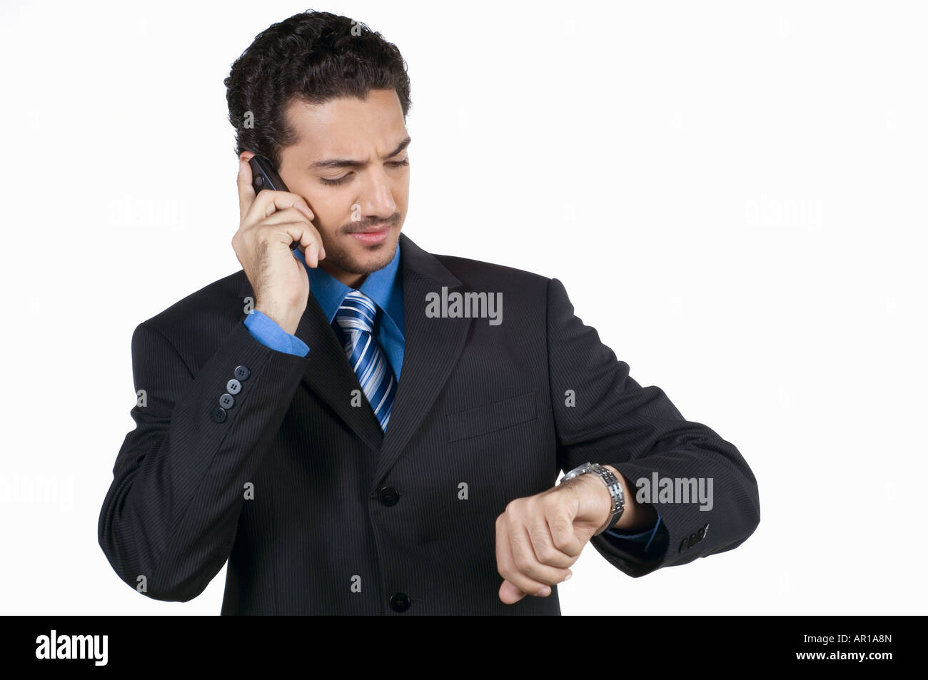 Young man on cell phone Stock Photo - Alamy