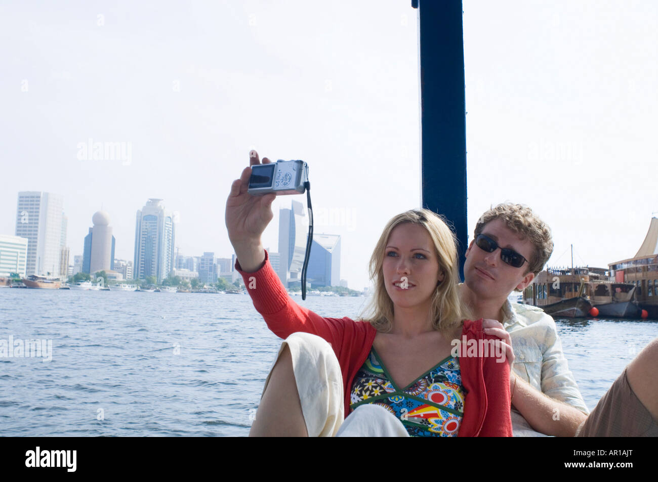 Couple on Abra at Dubai Creek, United Arab Emirates Stock Photo - Alamy