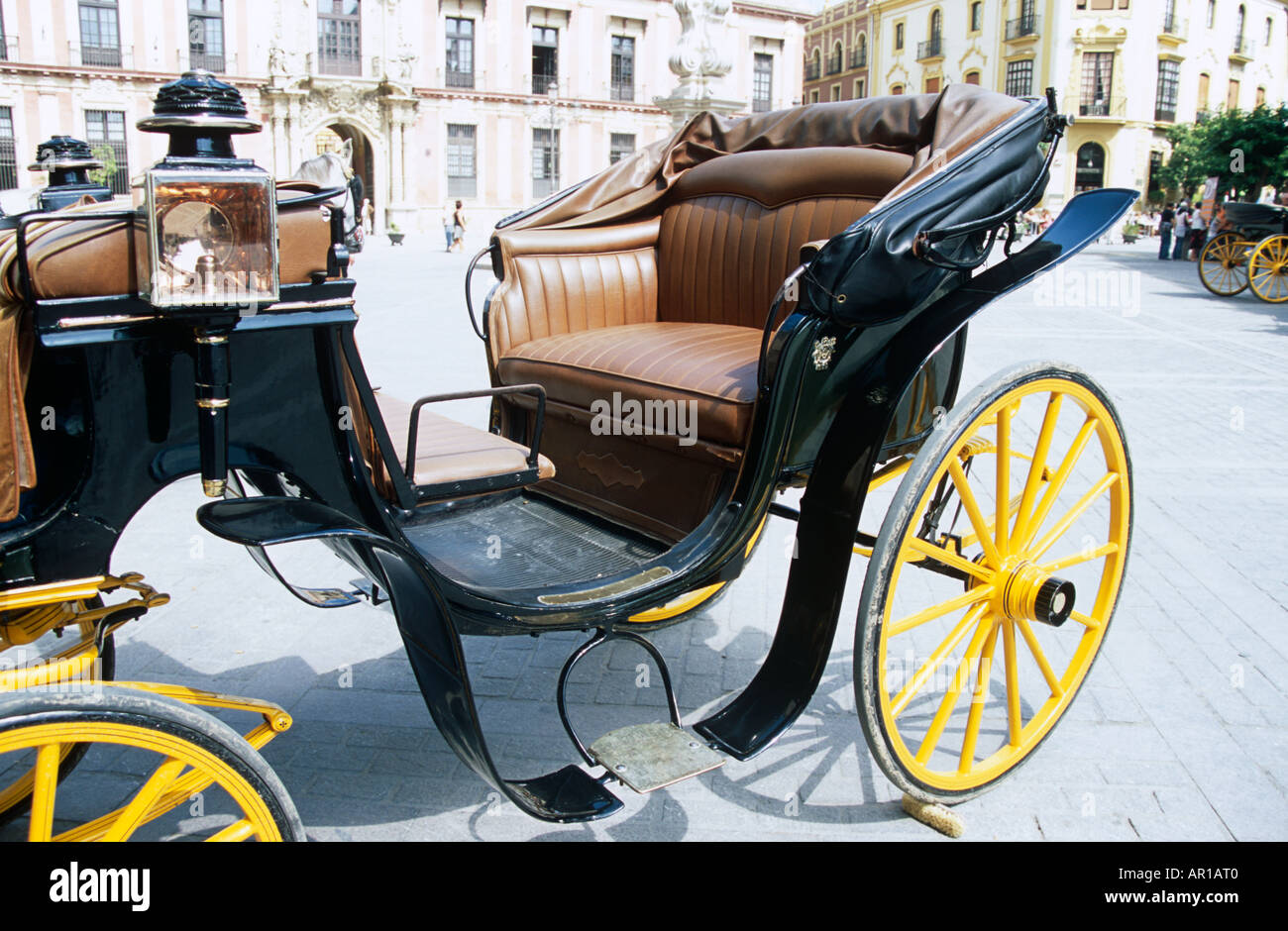 Horse drawn carriage in Plaza Virgen de los Reyes, Seville, Spain Stock ...