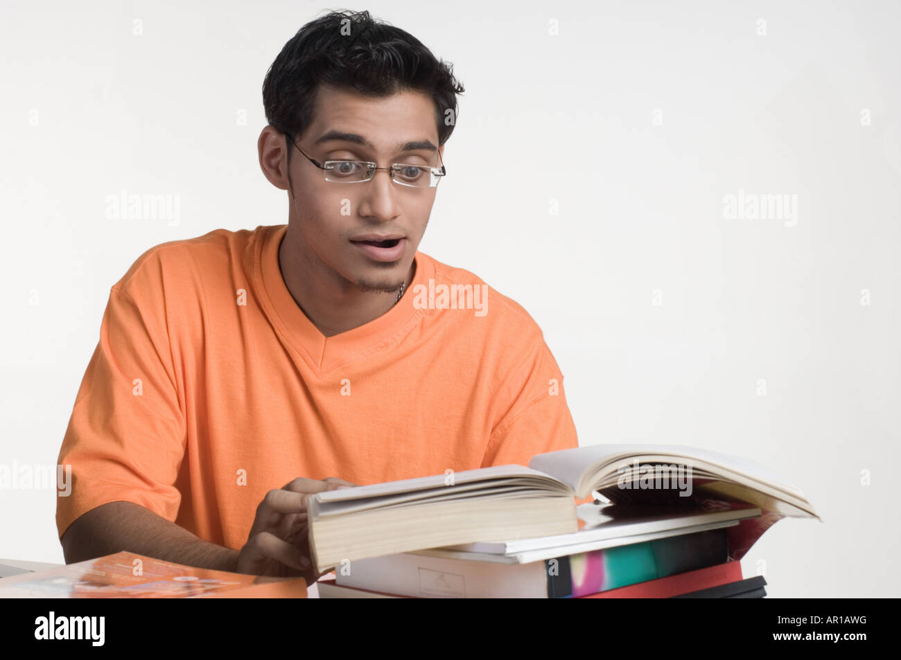 Young man reading book, close-up Stock Photo - Alamy