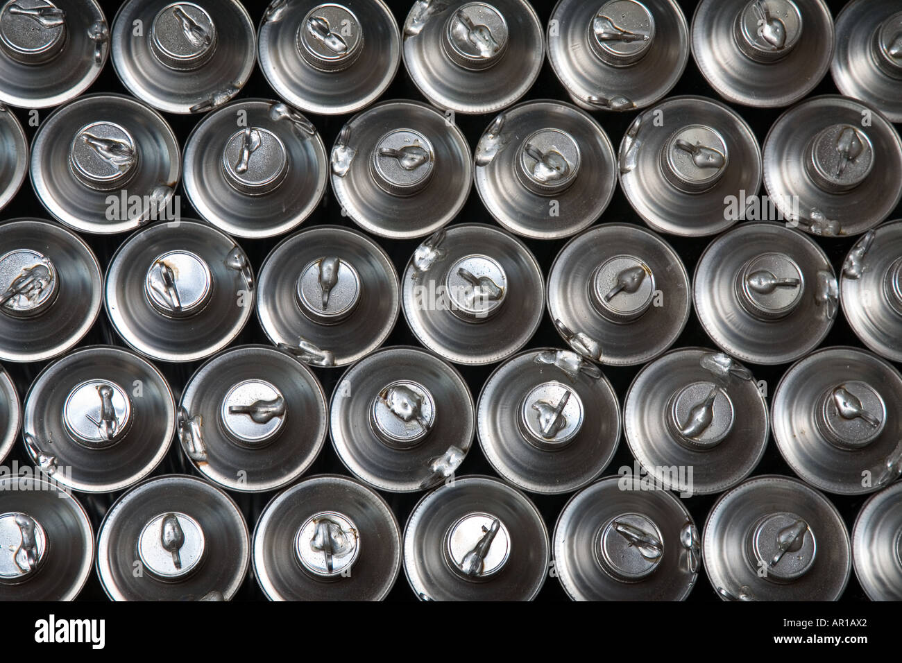 Rows of metal 1 litre cans Stock Photo - Alamy