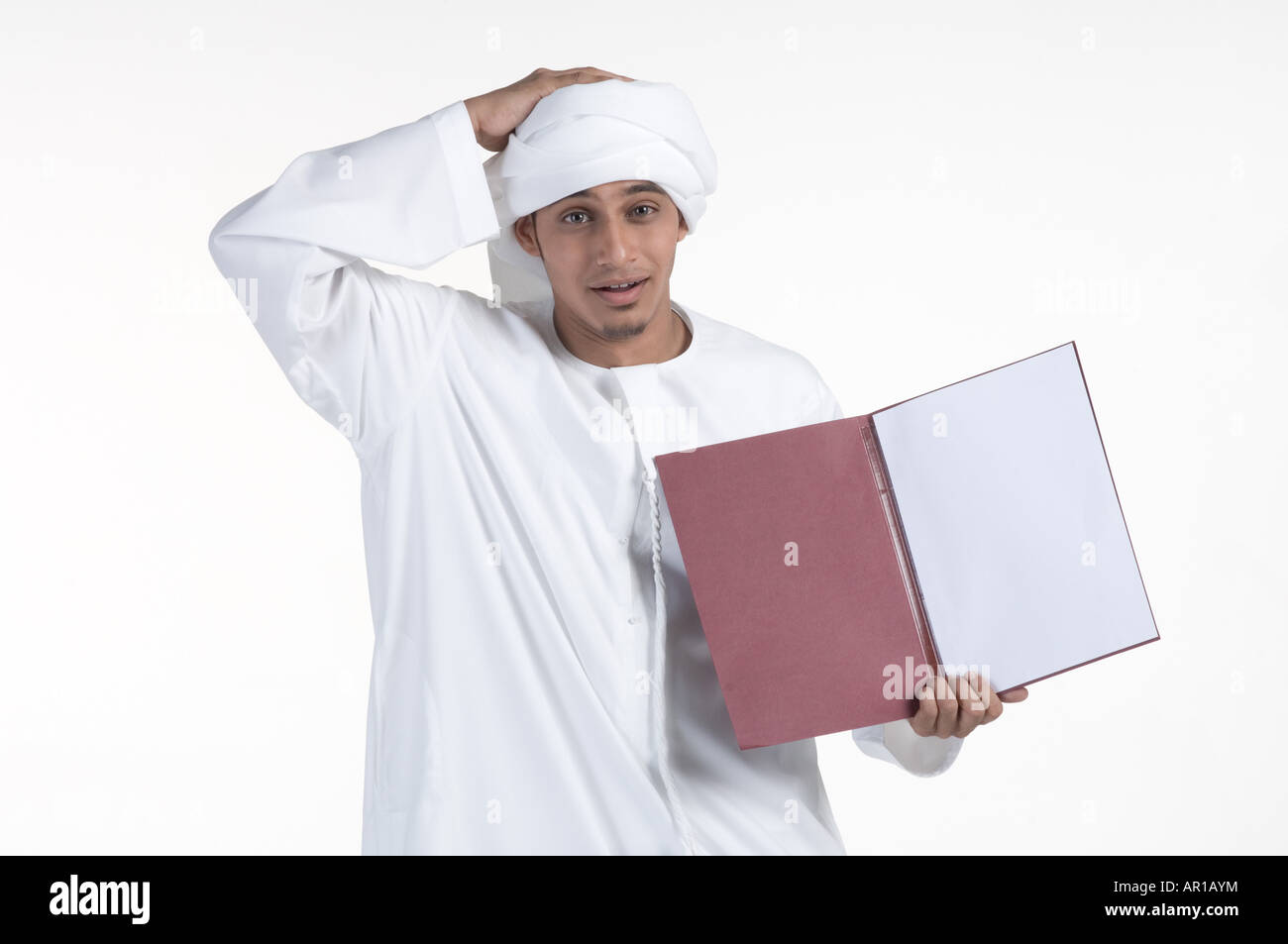 Young man holding file, portrait Stock Photo - Alamy