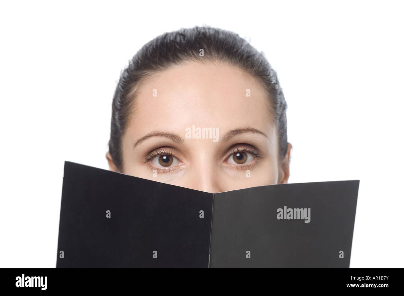 Young woman holding file, portrait Stock Photo - Alamy