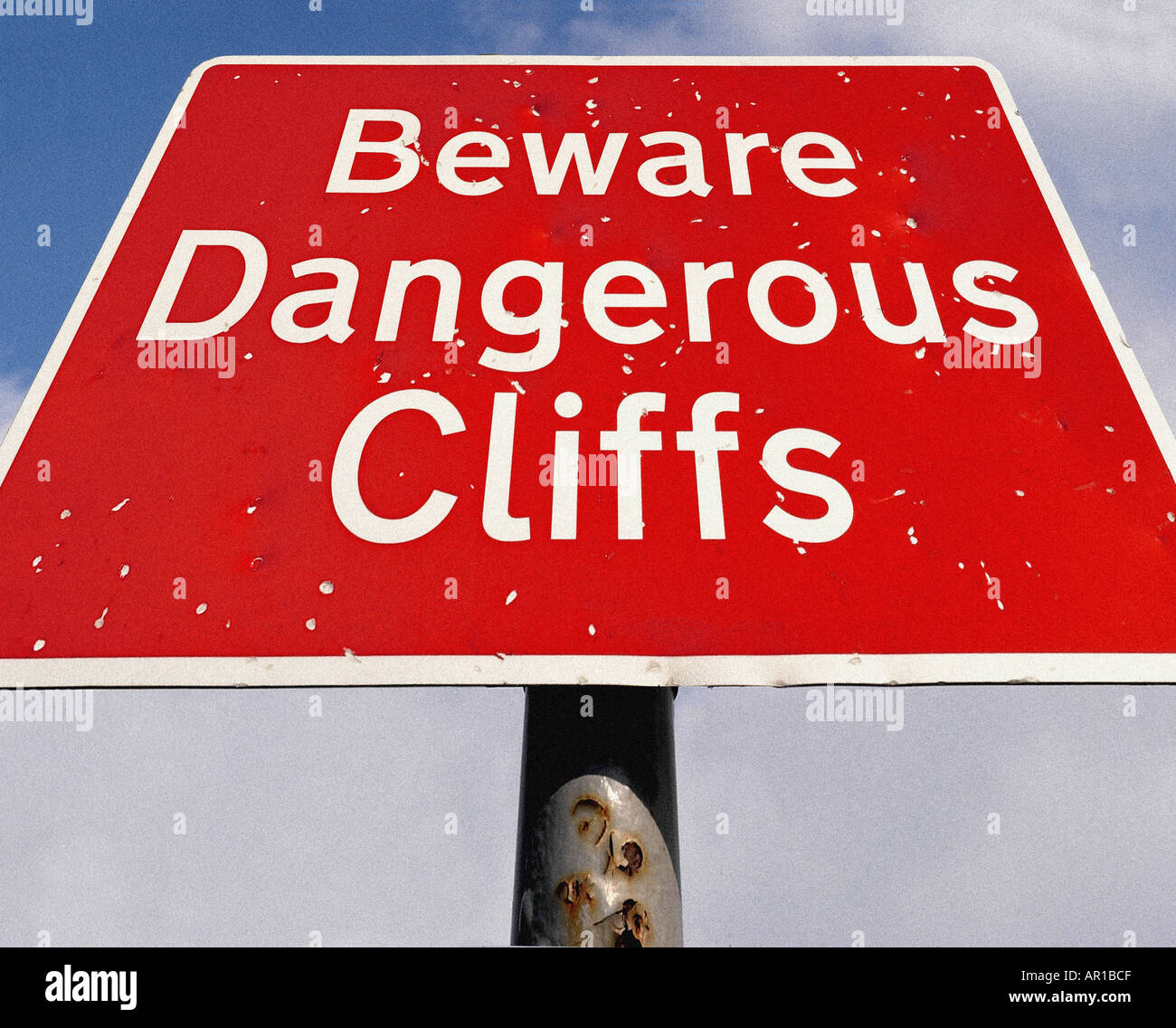 Beware Dangerous Cliffs sign Stock Photo - Alamy
