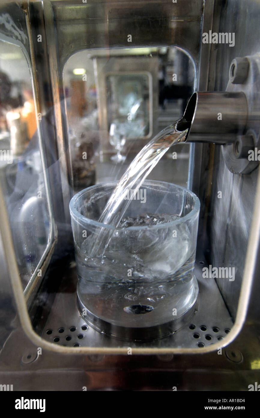 April 1996 Basildon UK The Gordons Gin factory Gin pouring from the ...