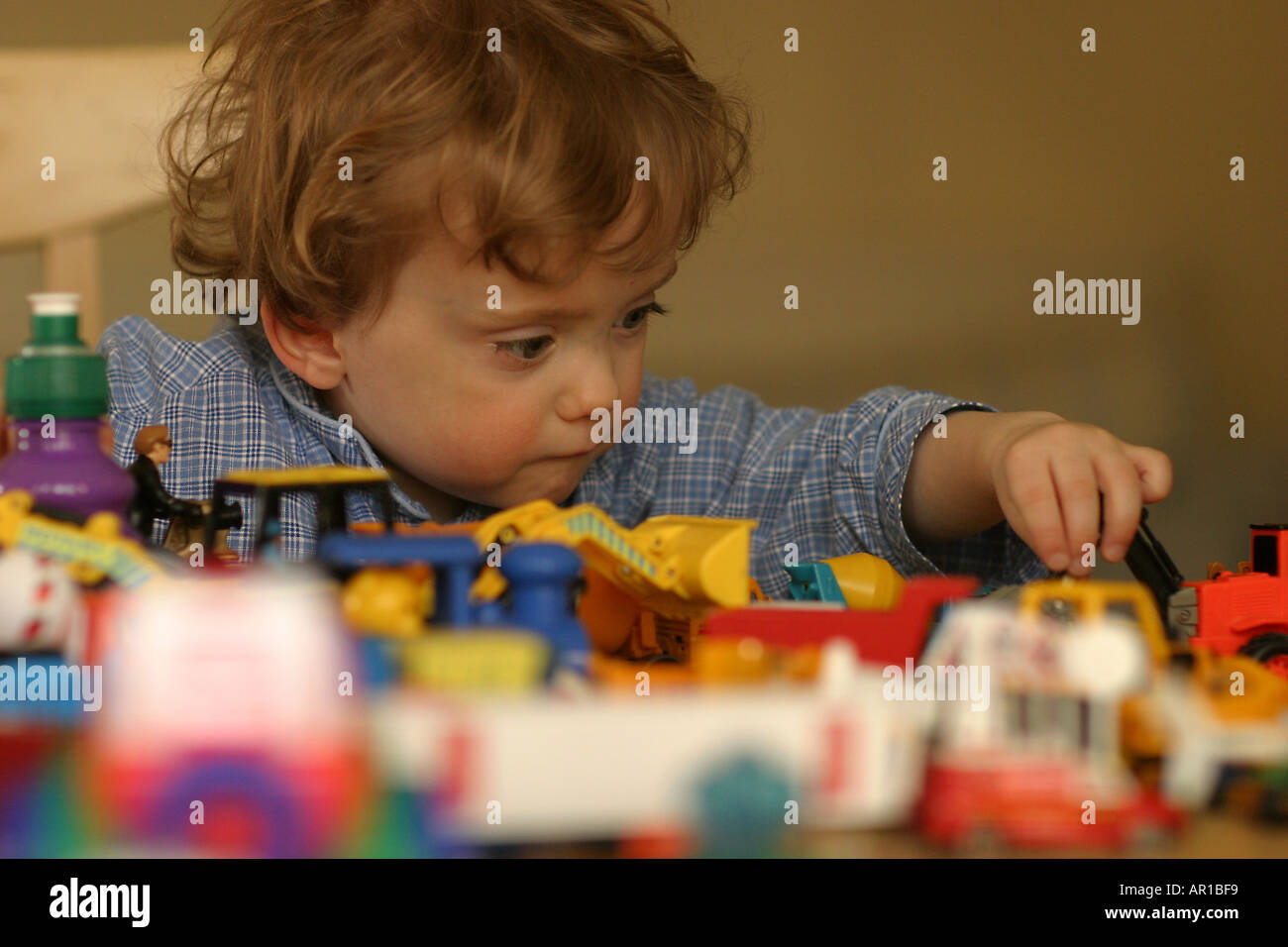 Lewis aged two and his car collection Stock Photo - Alamy