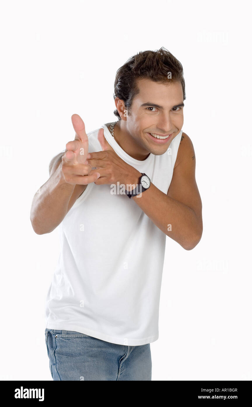 Young man gesturing, smiling, portrait Stock Photo - Alamy