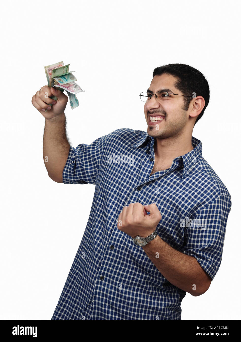 Arab man with money Stock Photo - Alamy