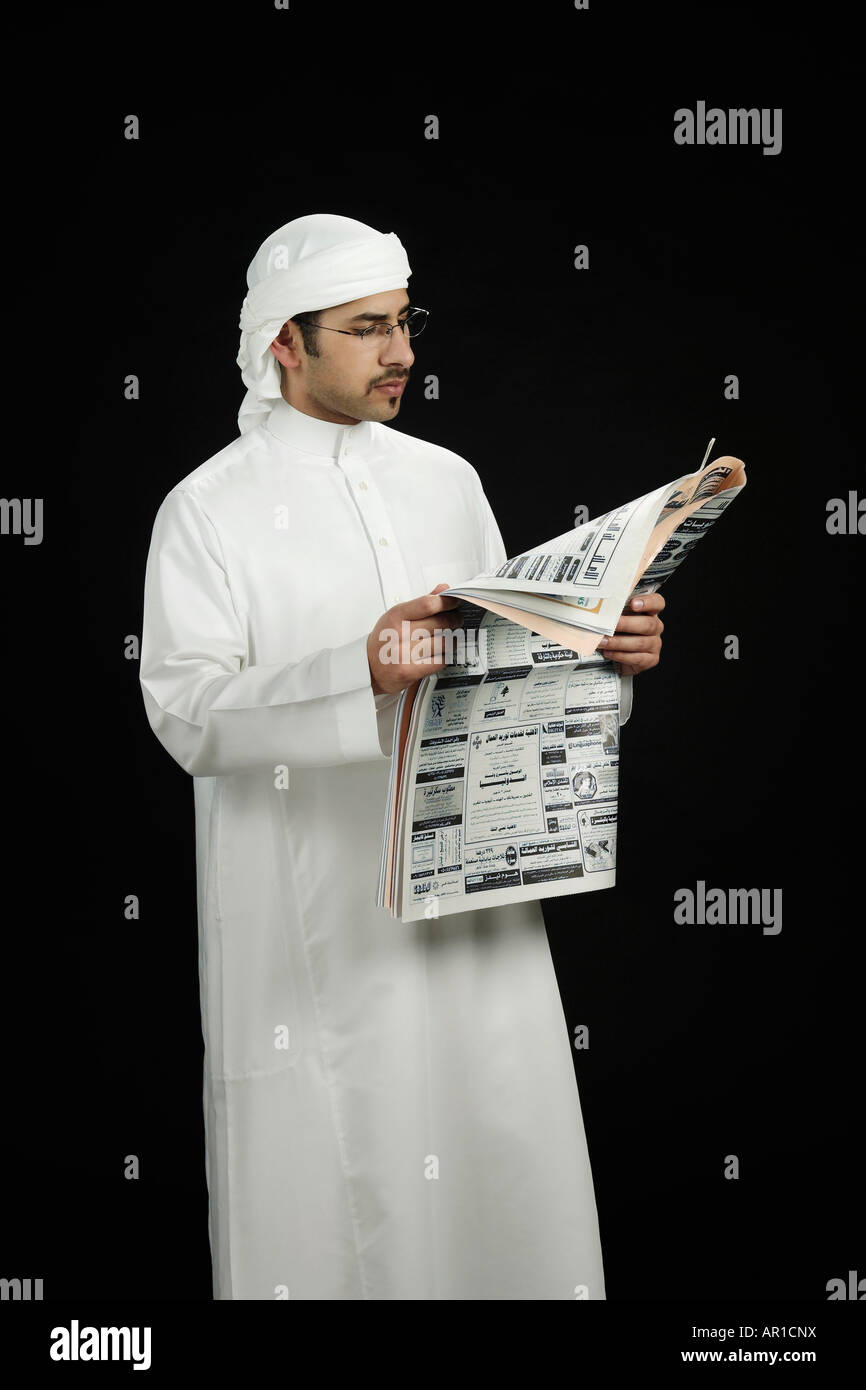 Arab man reading hi-res stock photography and images - Alamy