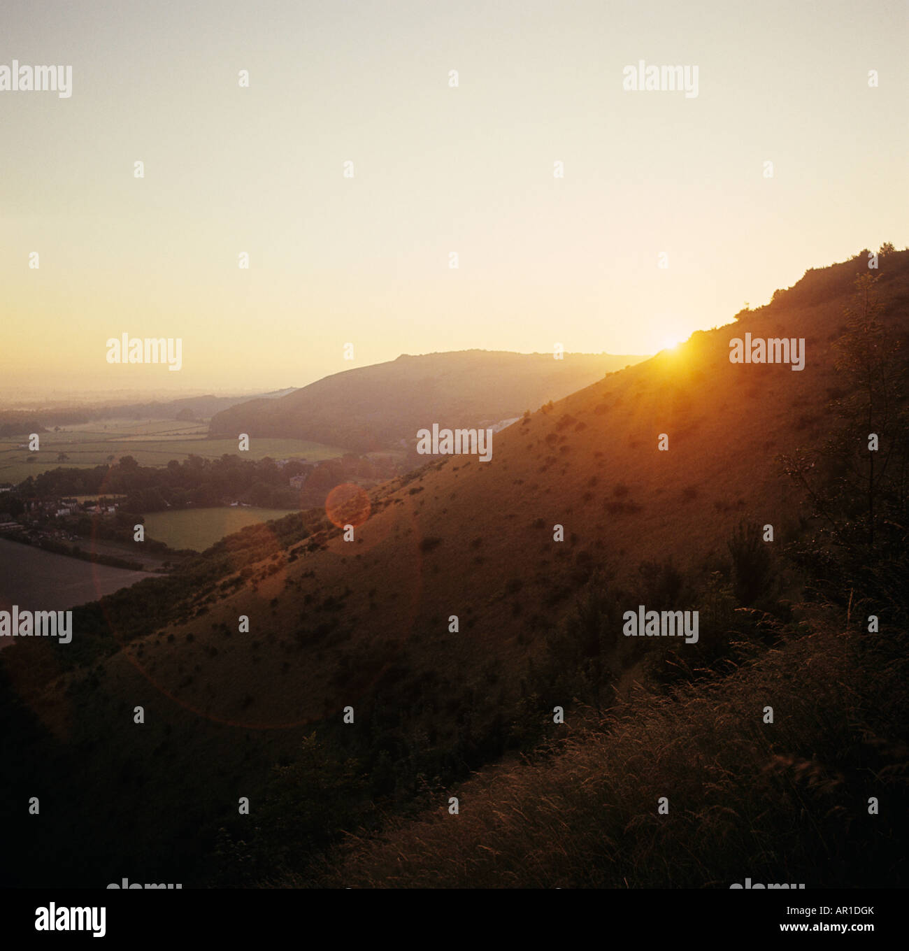 Sunrise over the Sussex Downs in England. Much of the South Downs have ...