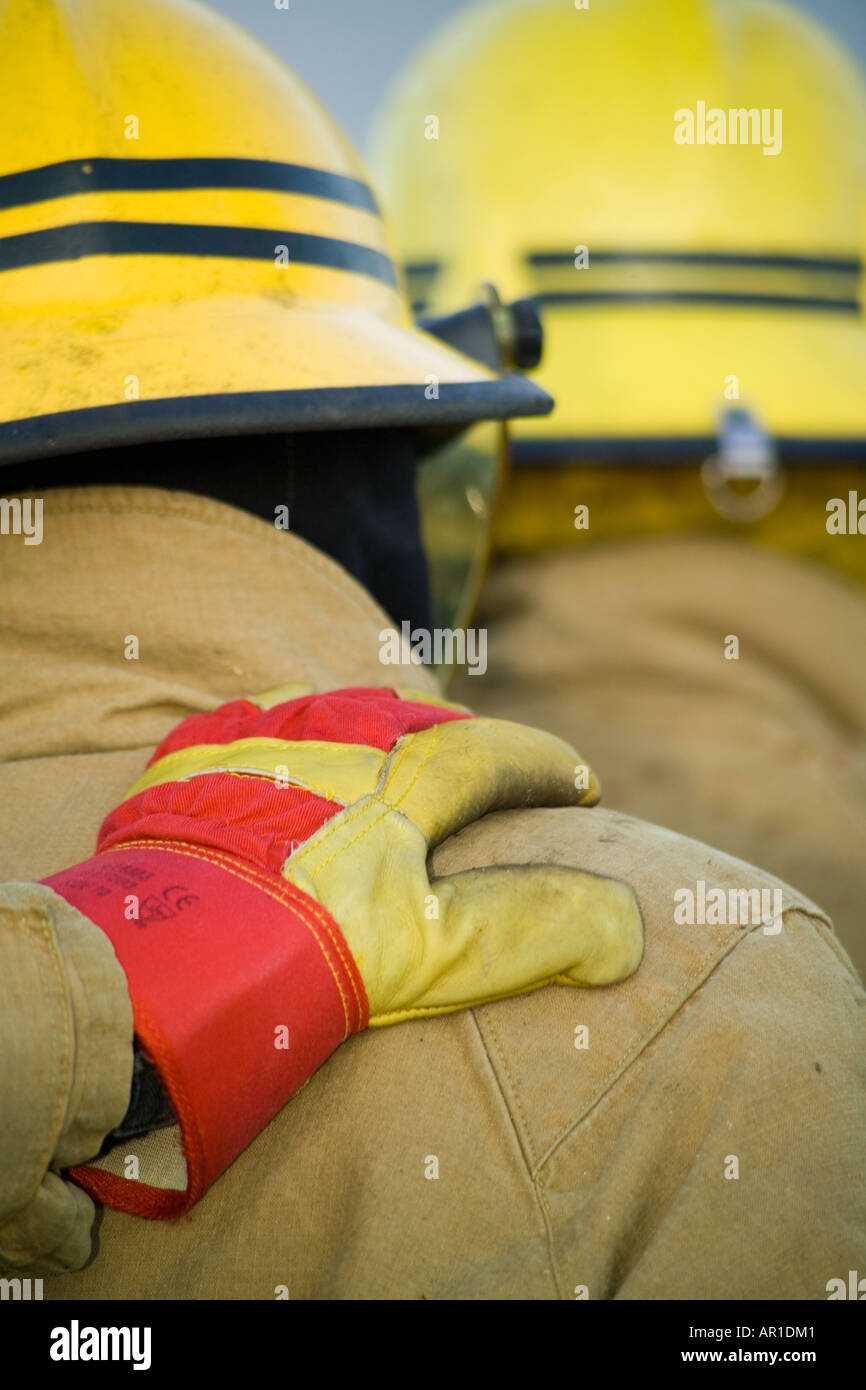 Firefighters teamwork and encouragement Stock Photo - Alamy