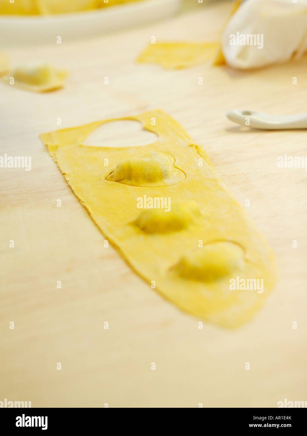 Preparation of hart-shaped ravioli, Italy Stock Photo - Alamy