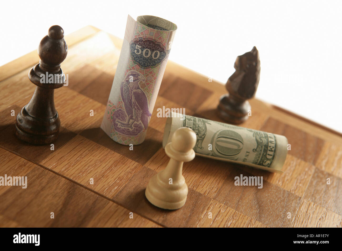 Dollars on chess board hi-res stock photography and images - Alamy