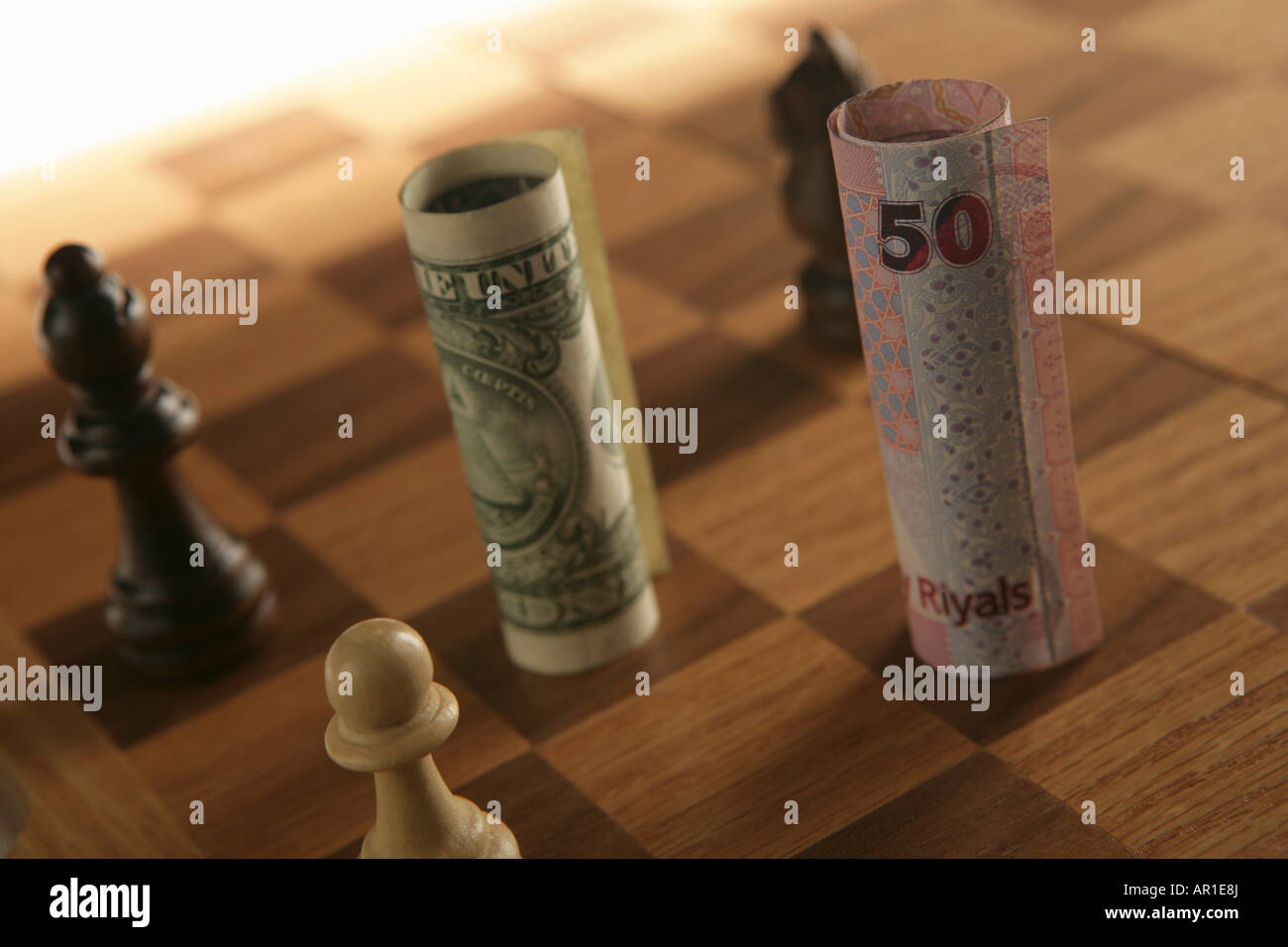 Money on the Chess Board Stock Photo - Alamy