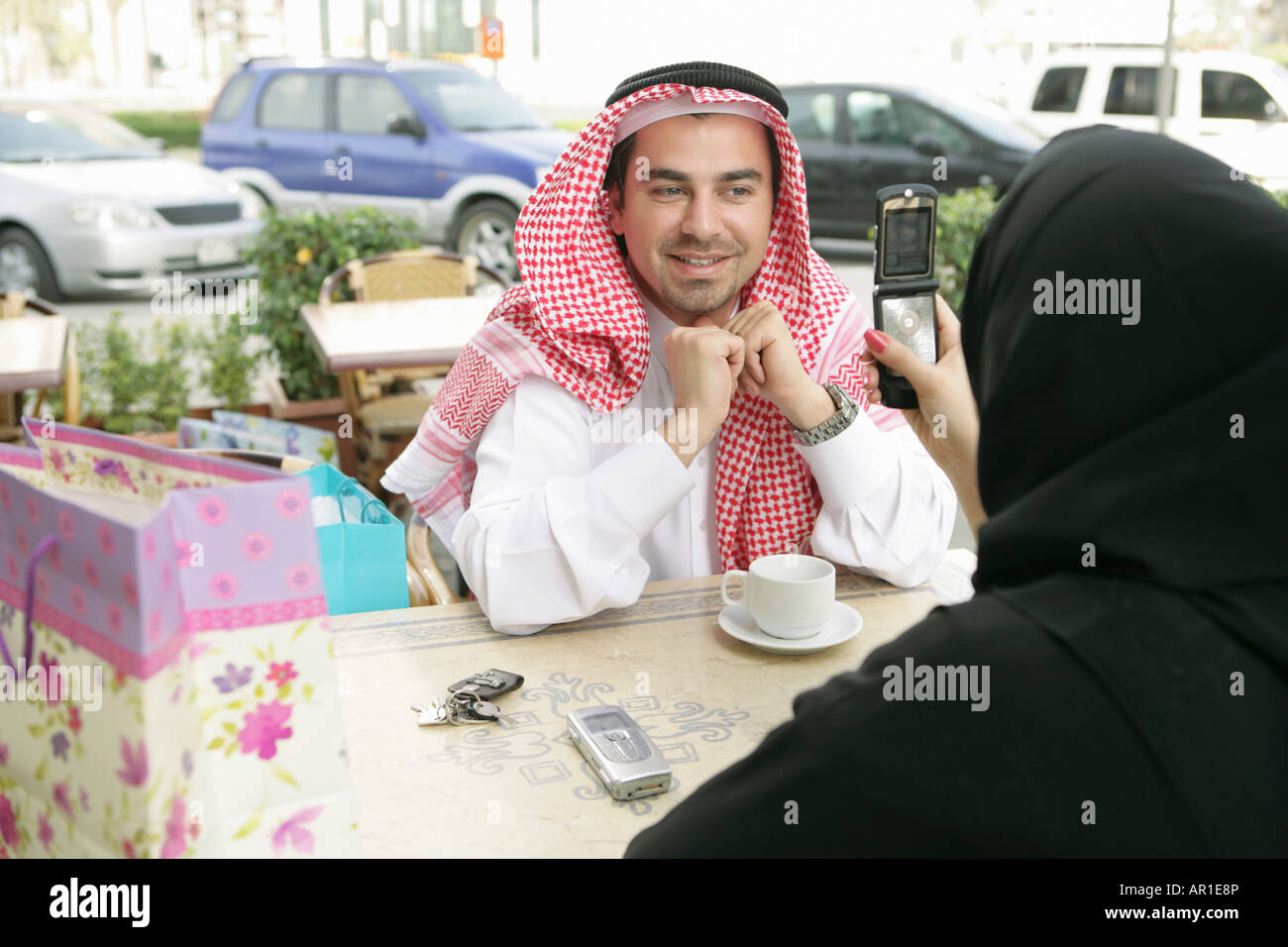 Arab Couple on a coffee break Stock Photo - Alamy