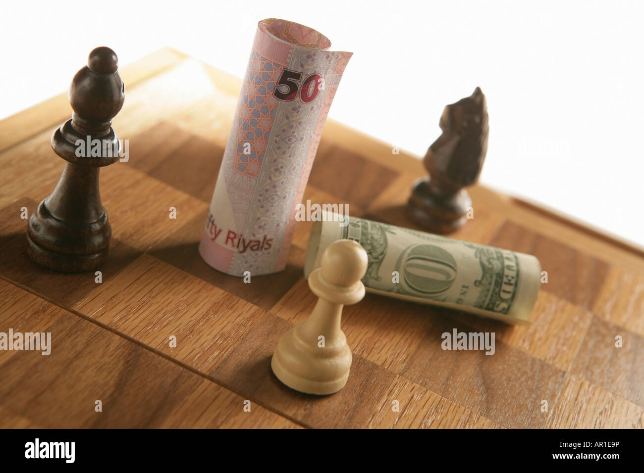Money on the Chess Board Stock Photo - Alamy