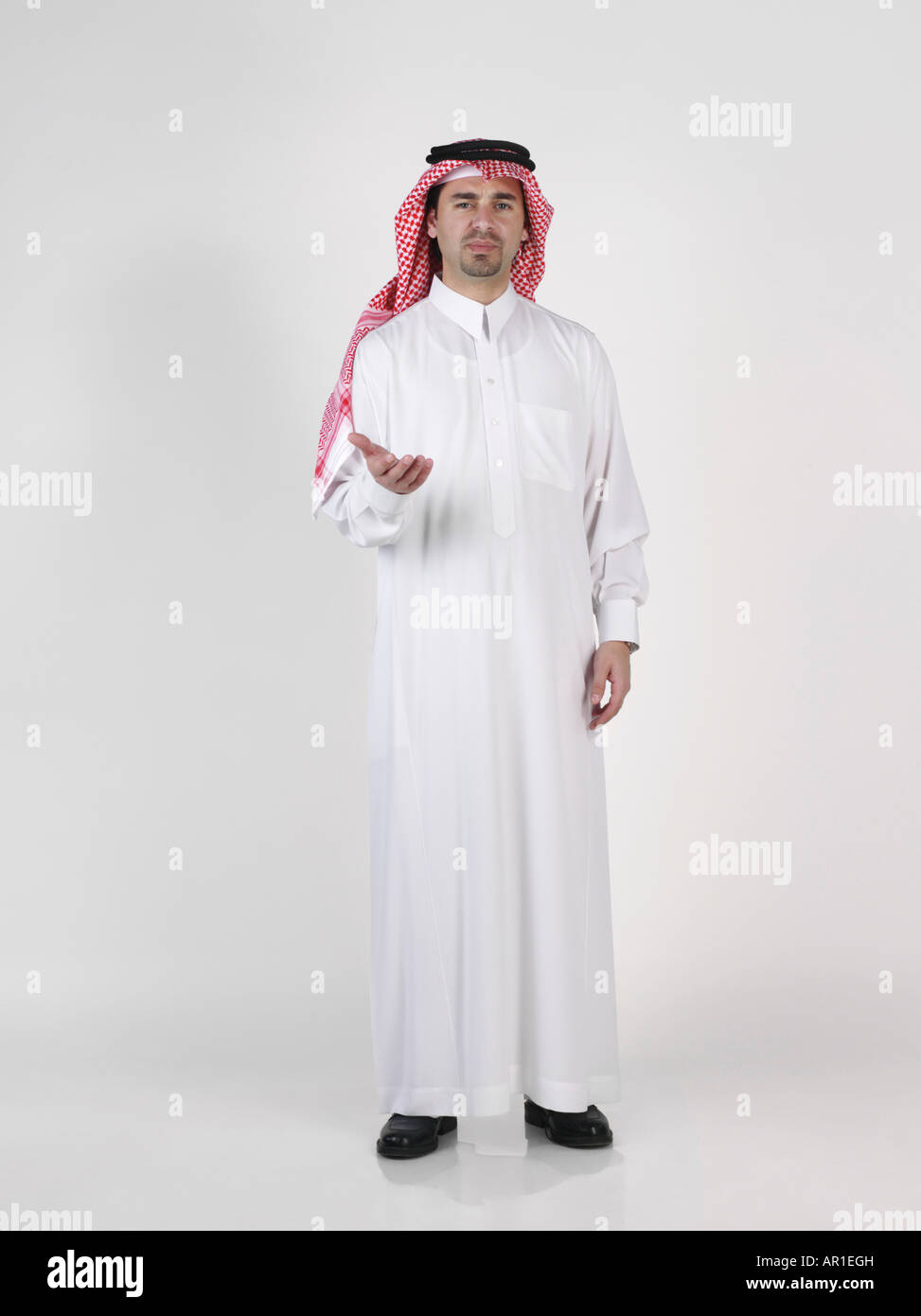 Arab Man looking at the camera Stock Photo - Alamy