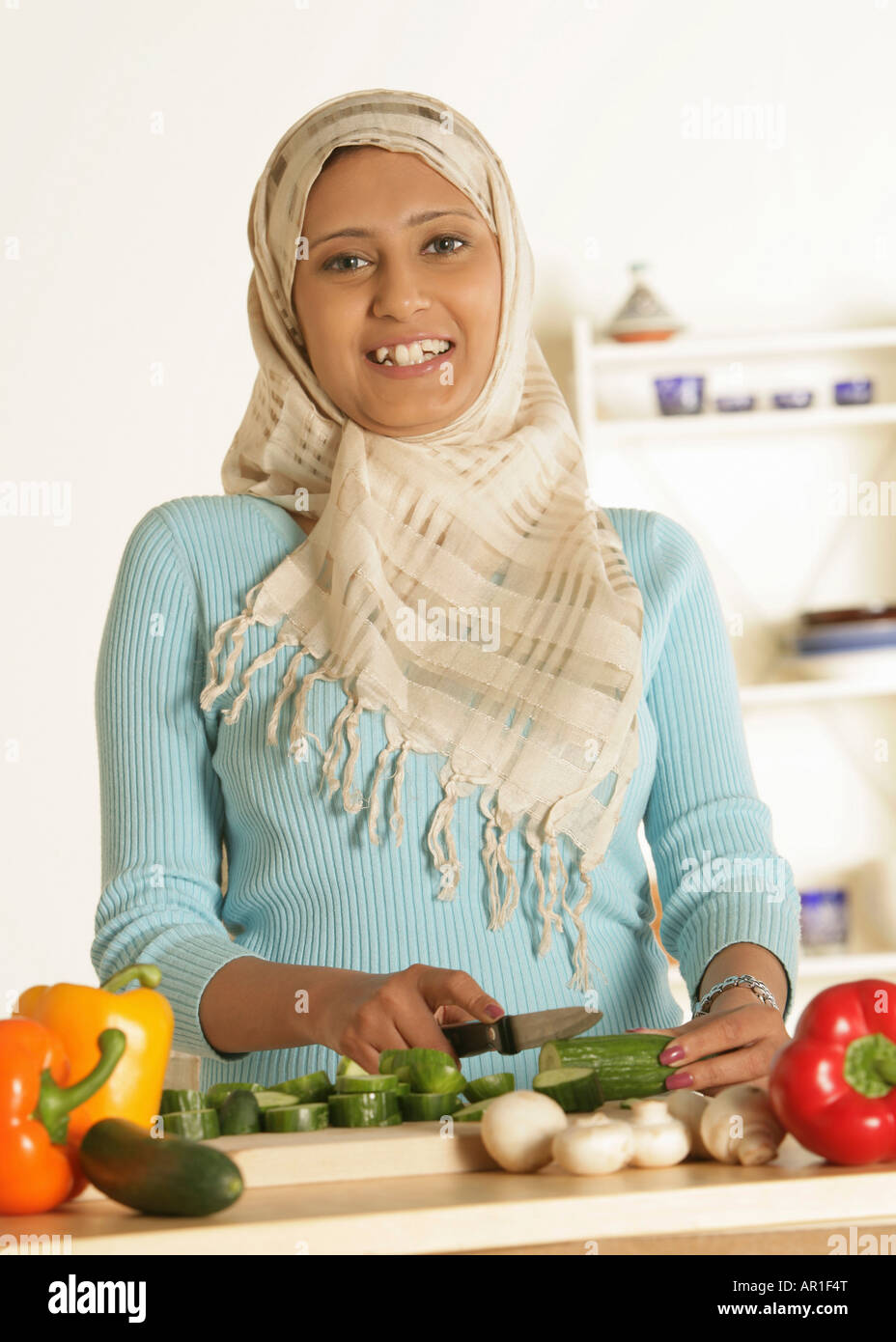 Arab Lady prepares the food Stock Photo - Alamy