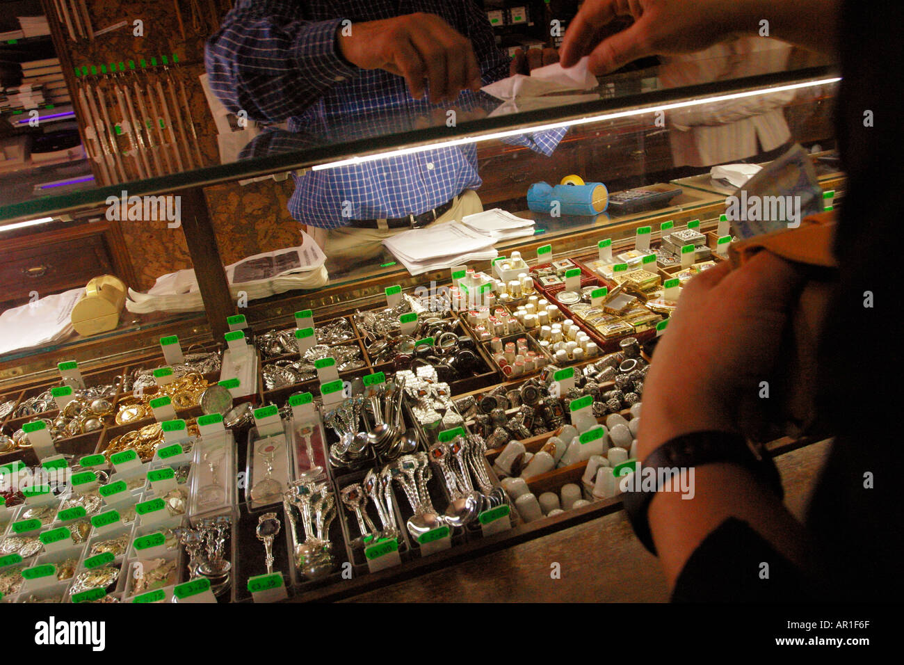 Tacky souvenirs and trinkets on sale at Guadalupe Stock Photo - Alamy