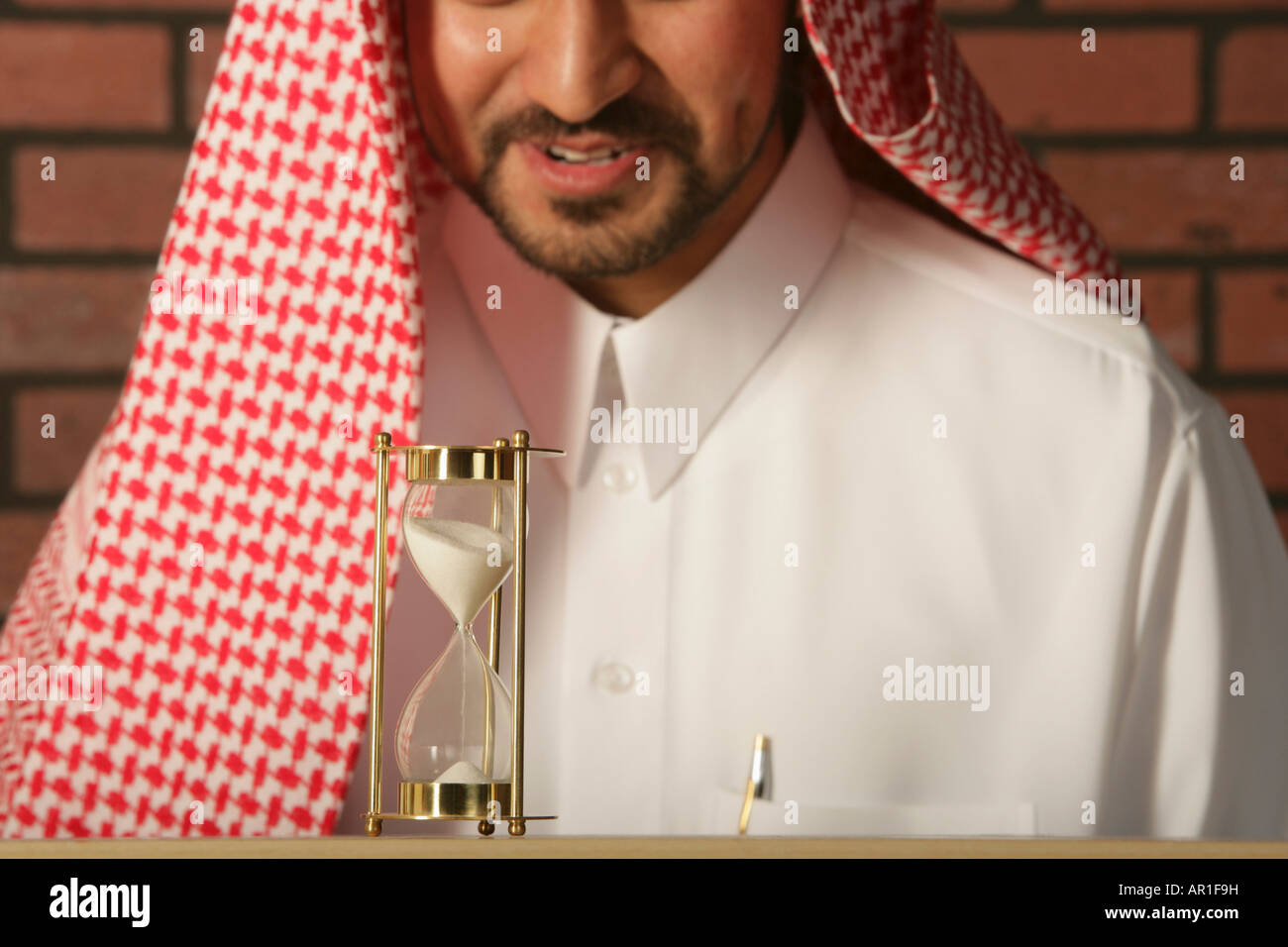 Arab man hourglass hi-res stock photography and images - Alamy