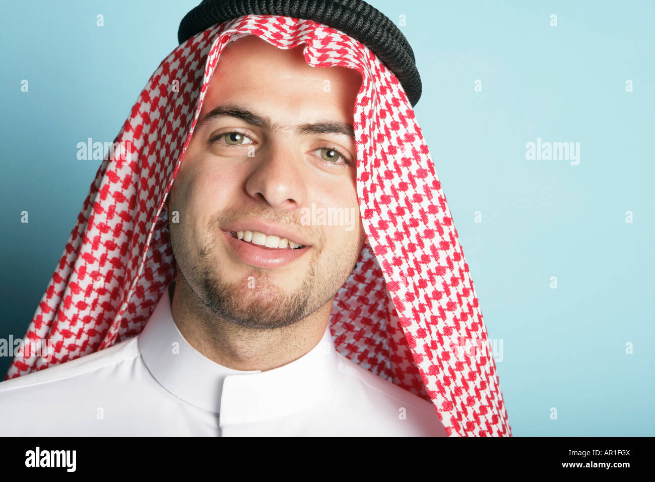 Arab Man Looking at Camera Stock Photo - Alamy