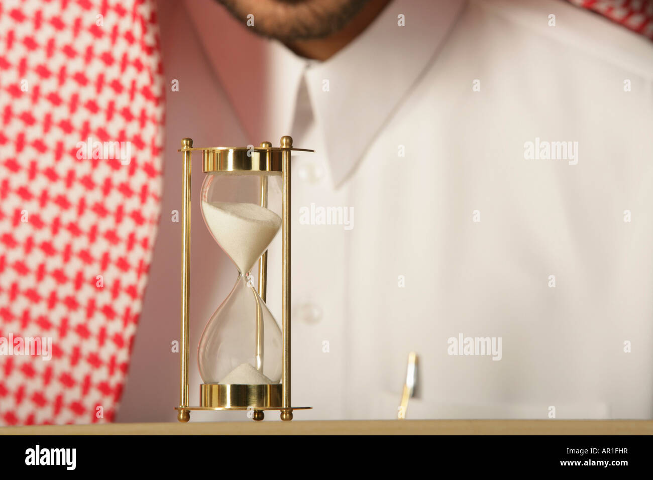 Arab man hourglass hi-res stock photography and images - Alamy