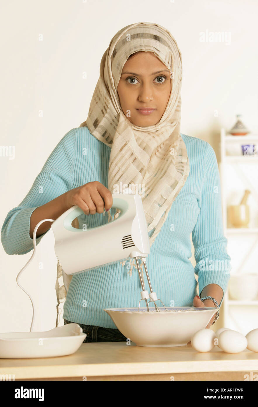 Arab Lady prepares the food Stock Photo - Alamy