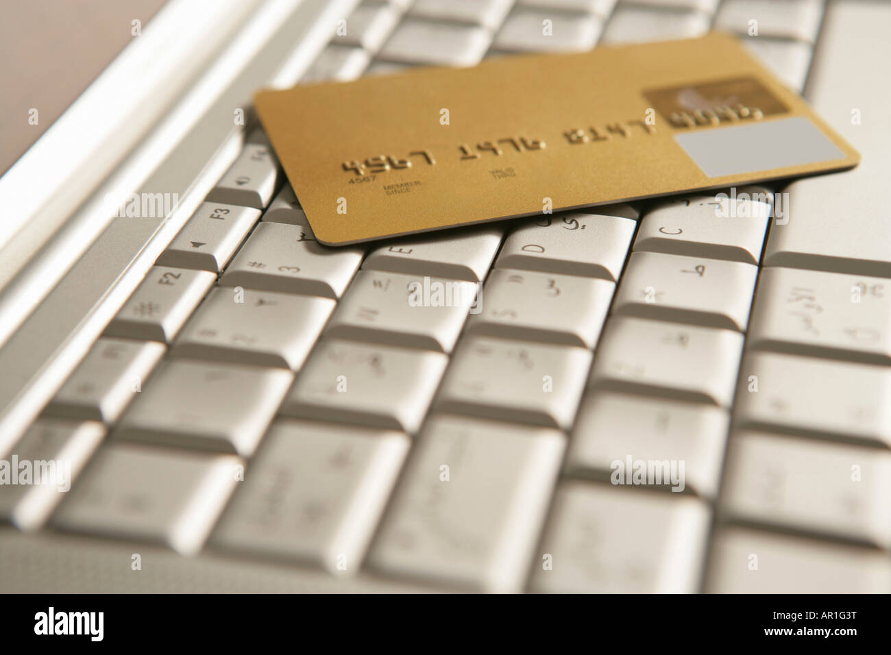 Credit card on a laptop Stock Photo - Alamy