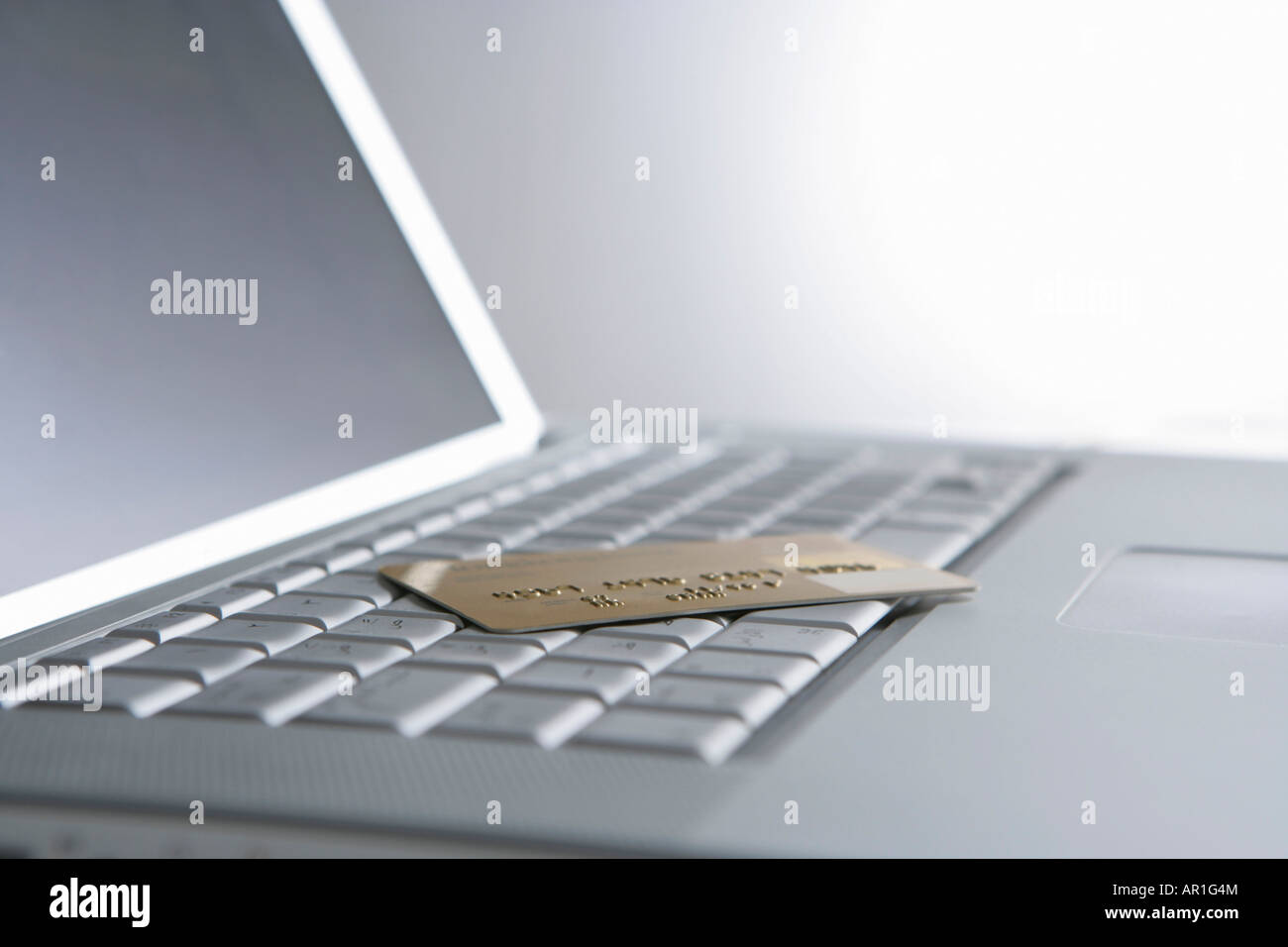 Credit card on a laptop Stock Photo - Alamy