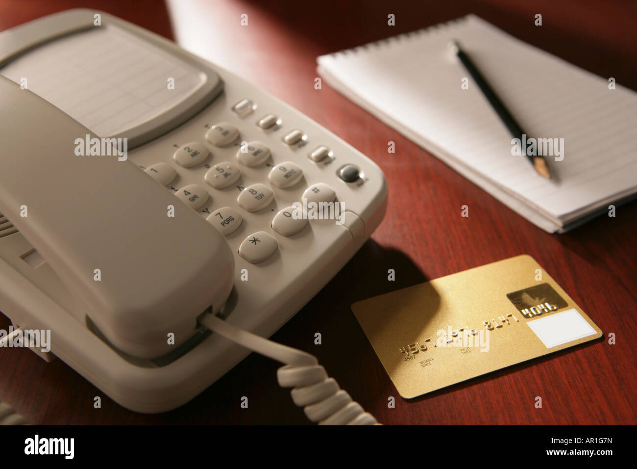 Credit Card and a telephone Stock Photo - Alamy