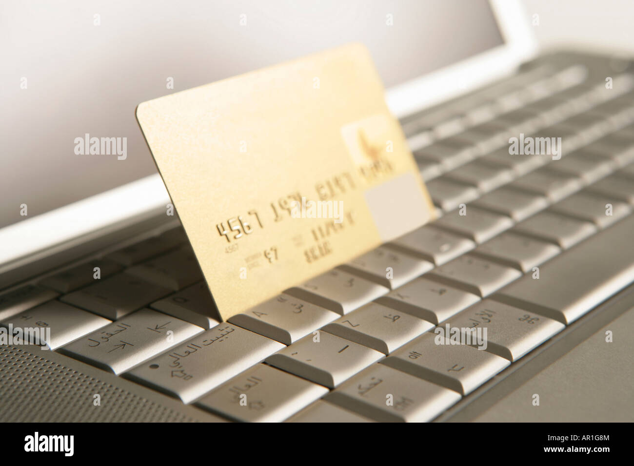 Credit card on a laptop Stock Photo - Alamy