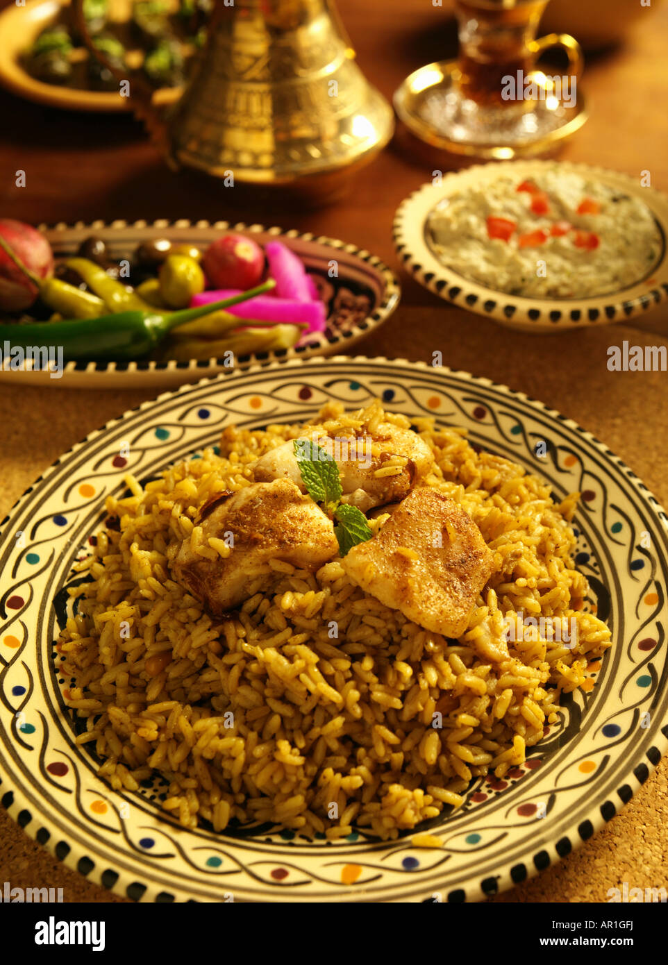 Arabic Food - Fish Biryani with accompaniments Stock Photo - Alamy